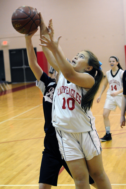 Eagle's Nest basketball swoops two games from Lighthouse Christian ...
