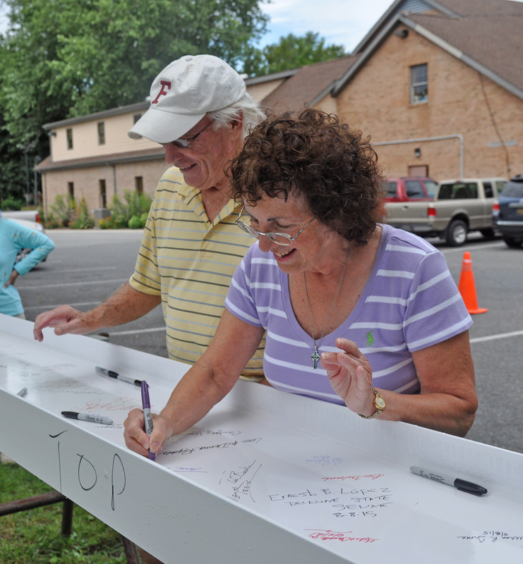 Community signs final beam for new Lewes library | Cape Gazette