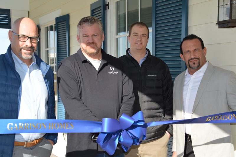 Ribbon cutting held for Garrison Homes model at The Peninsula | Cape ...