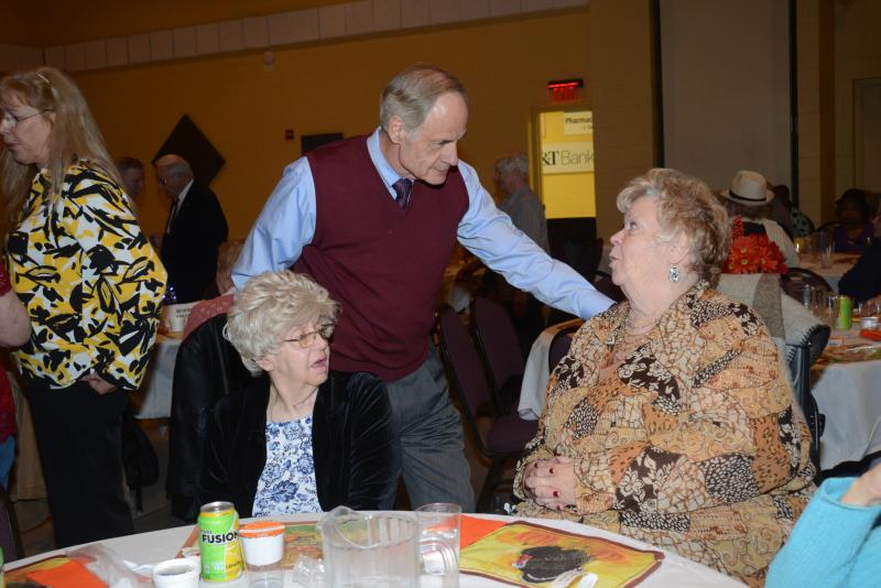 Sen. Tom Carper attends CHEER holiday feast | Cape Gazette