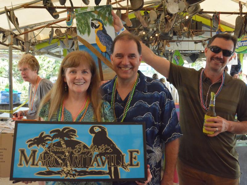 Seashore Parrot Club raises money for Surfgimp Foundation | Cape Gazette