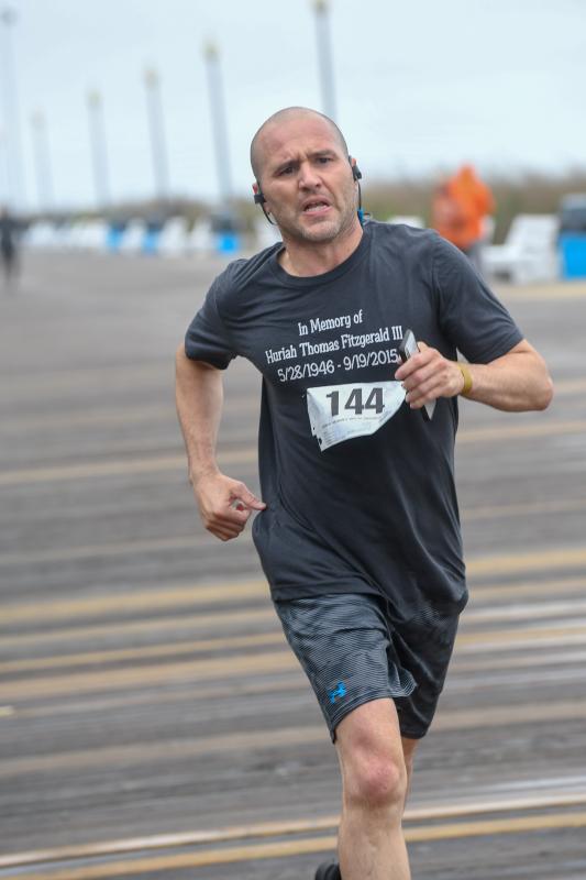 Wet and windy weather for the SPF at the Beach for Melanoma 5K | Cape ...