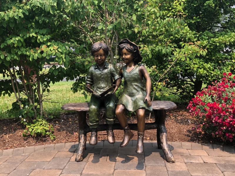 ‘Best Friends Reading’ sculpture to be unveiled at library Aug. 14 ...