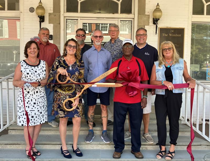 Escapades Travel cuts ribbon in Milford | Cape Gazette