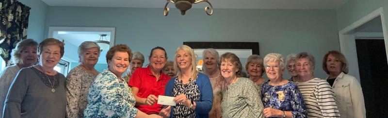 Xi Sigma chapter donates to therapeutic riding center | Cape Gazette